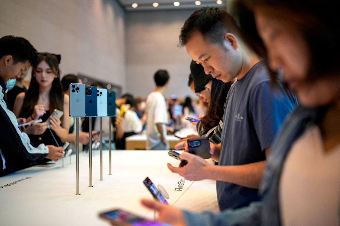 Solved Problem: The Price Elasticity of Demand for iPhones in China ...